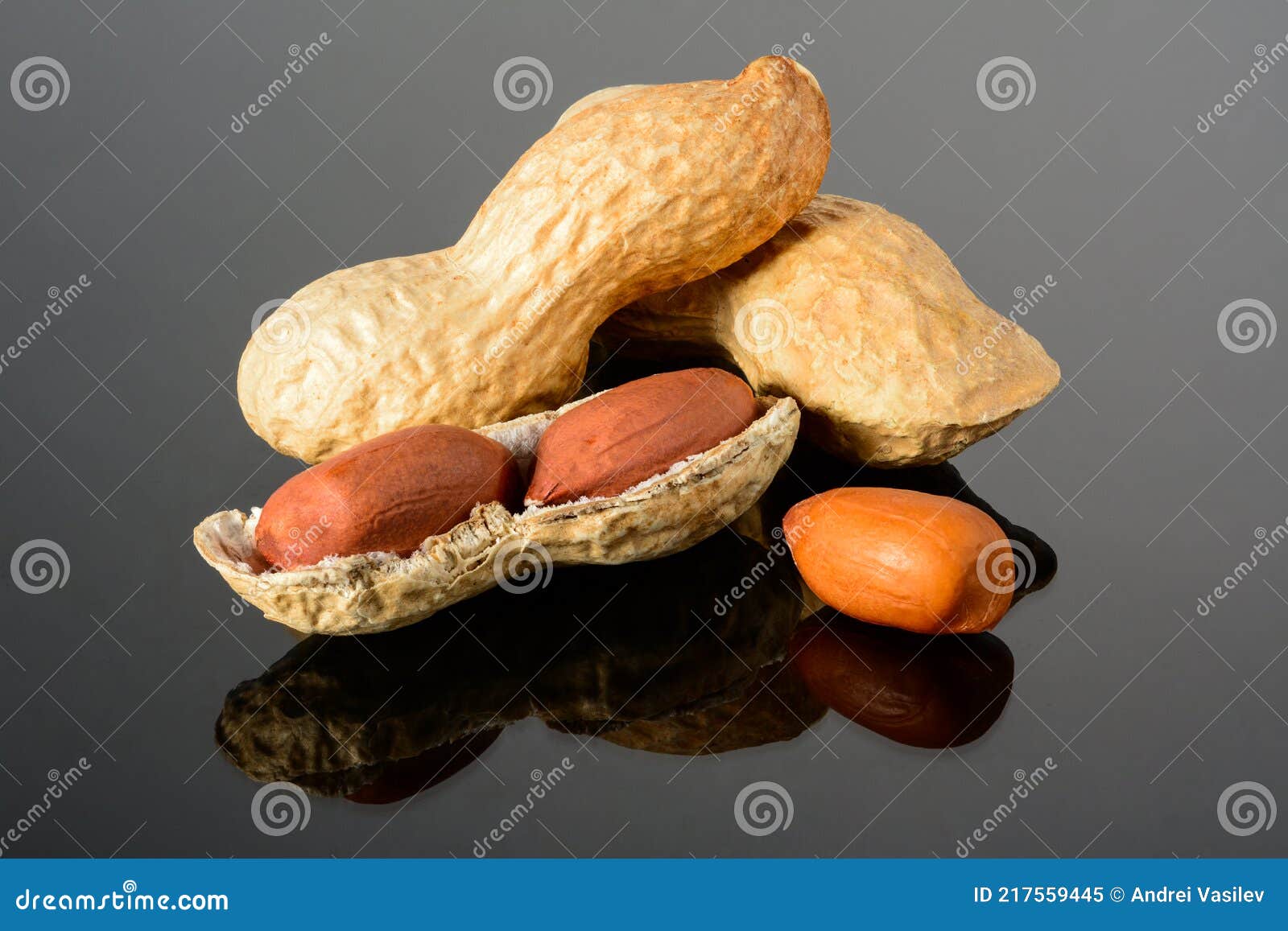 Peanut on Glossy Black Surface with Reflection. Two Whole Peanuts and ...