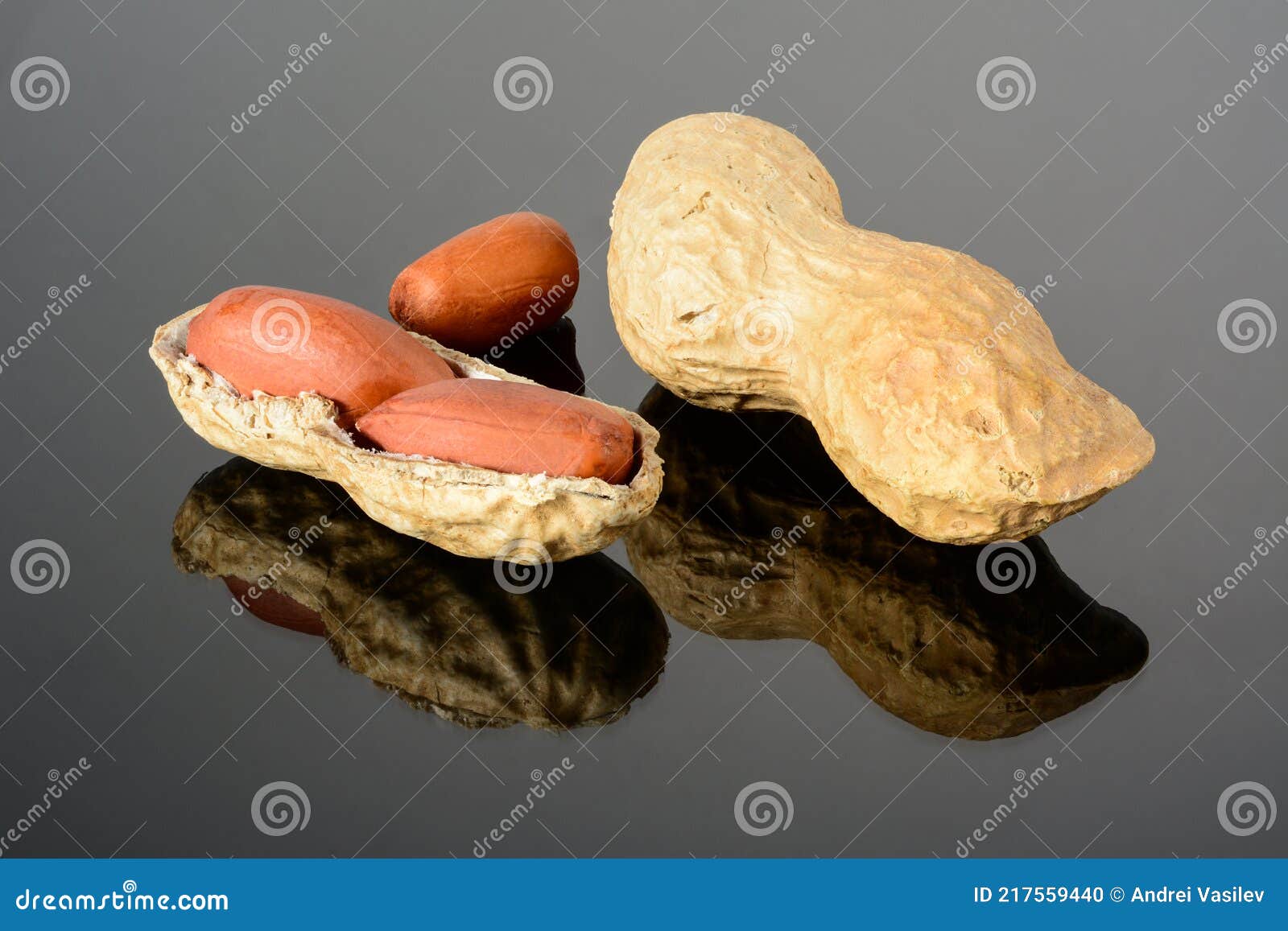 Peanut on Glossy Black Surface with Reflection. Whole Peanut and Open ...
