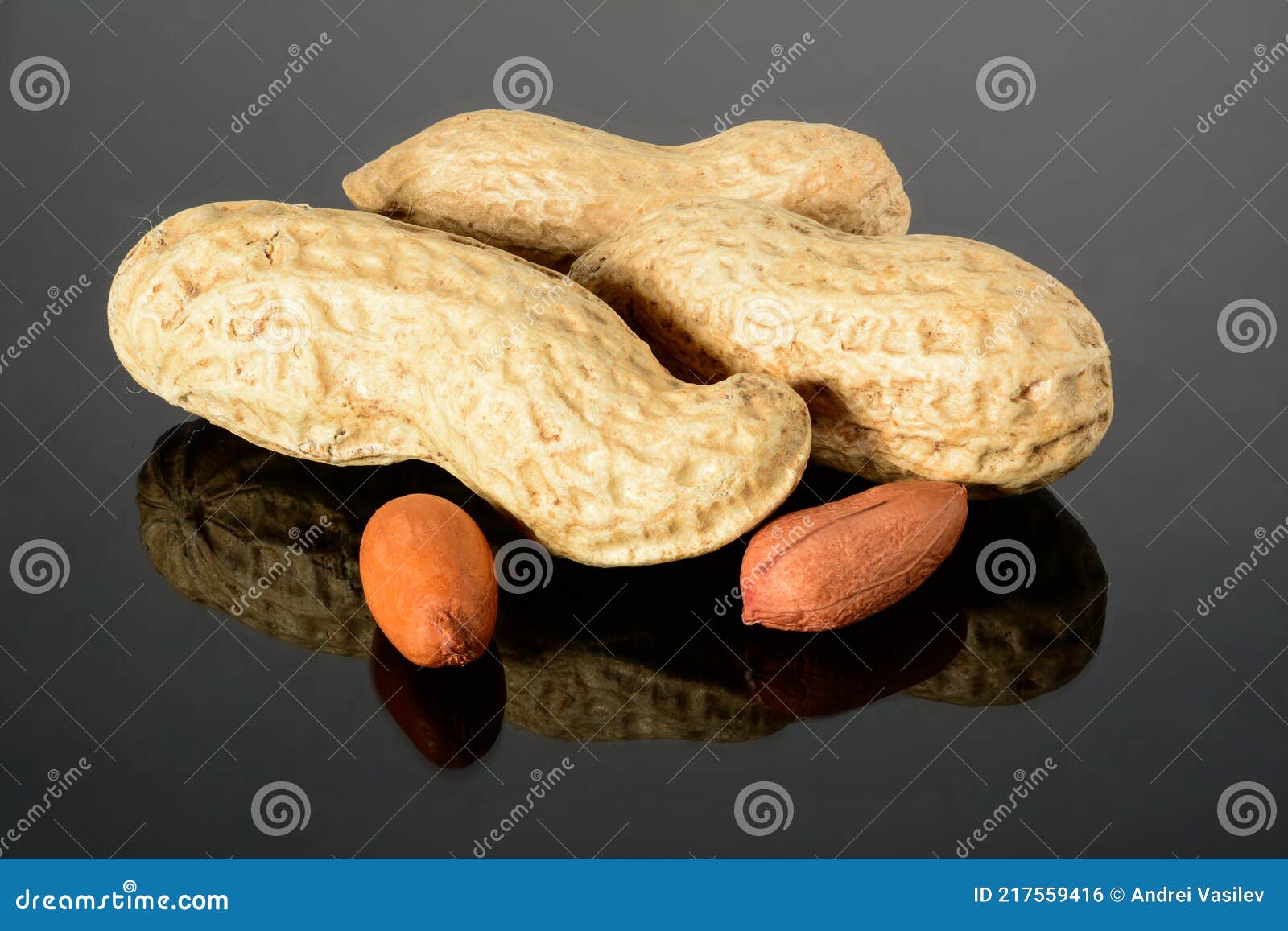 Peanut On Glossy Grey Surface With Reflection. Three Whole Real Peanut ...