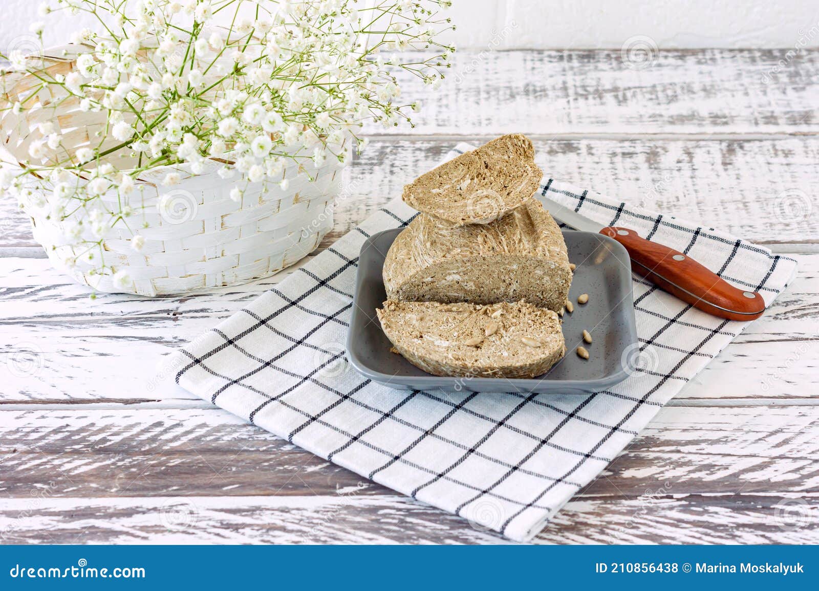 Peanut Halva on a Plate on White Wooden Table. Oriental Dessert from ...