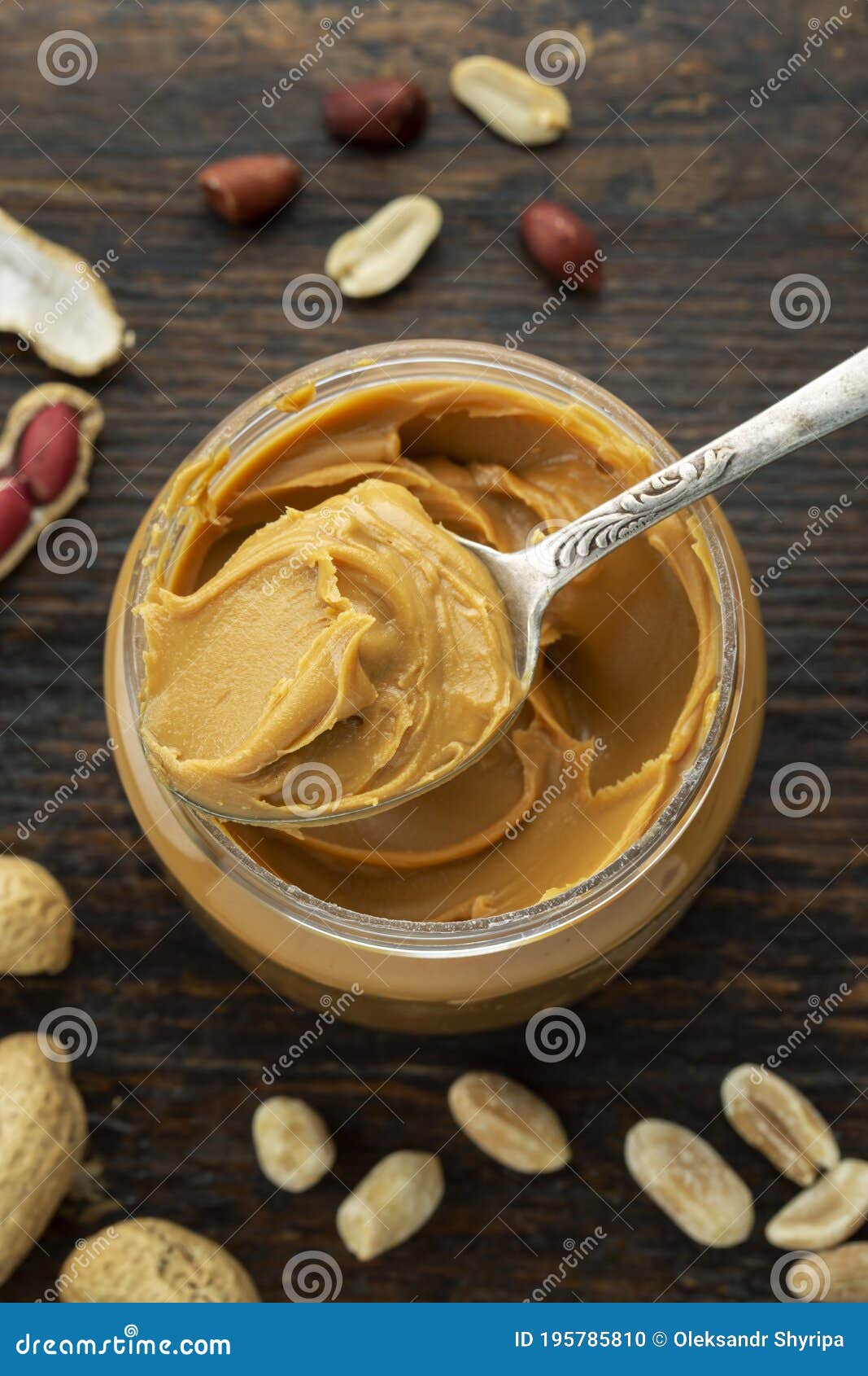 Peanut Paste in an Open Jar and Peanuts in the Peel Stock Photo - Image ...