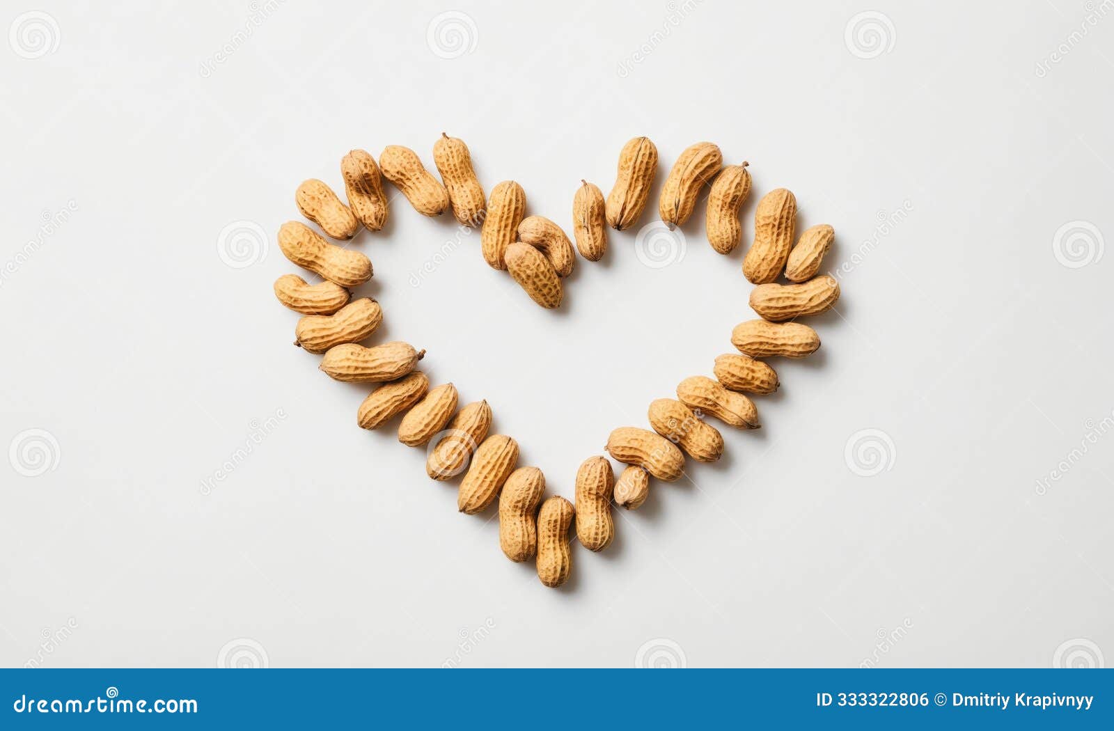 Peanuts Arranged in a Heart Shape on White Background Stock ...