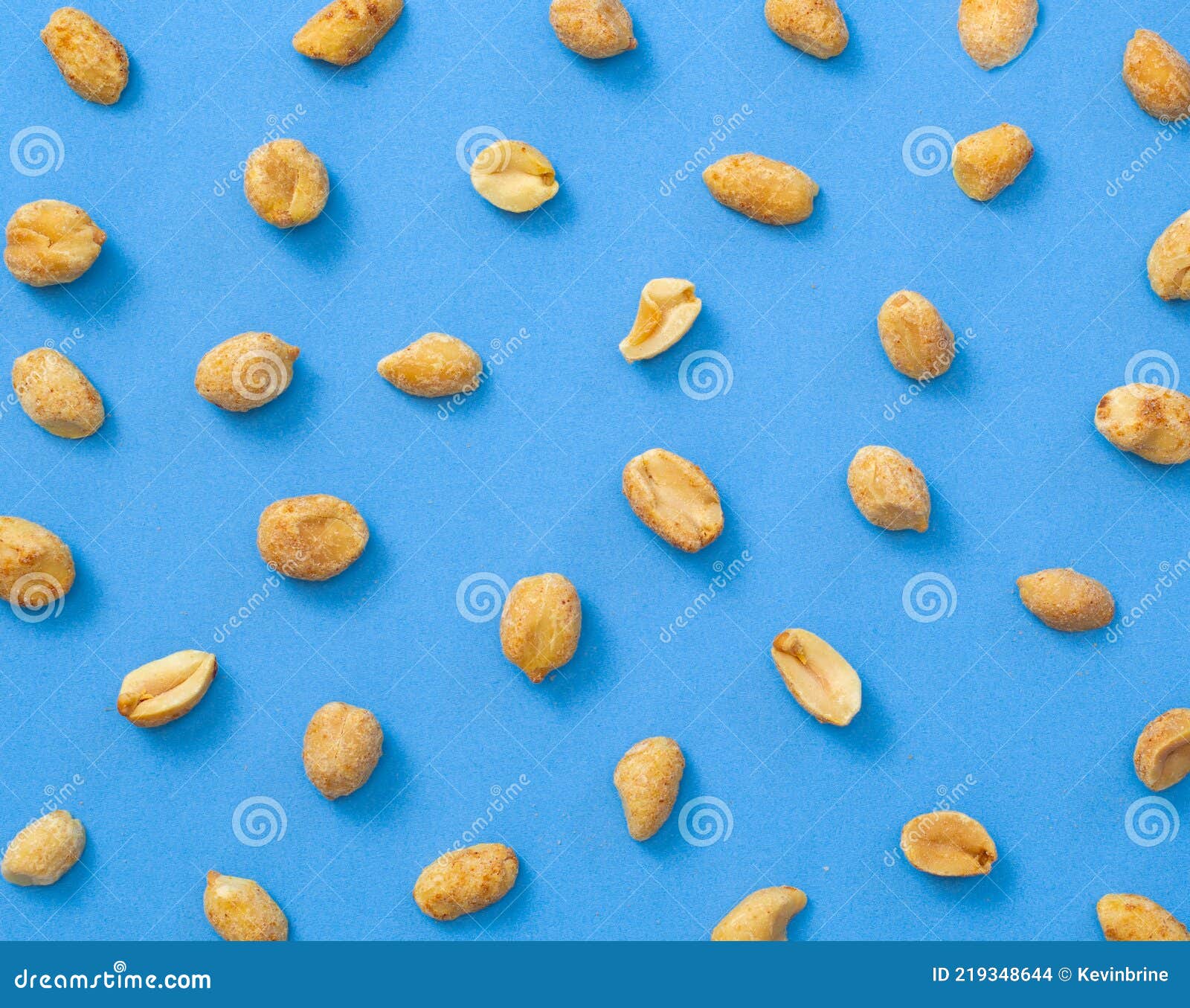 Peanuts on Blue stock photo. Image of calorie, peeled - 219348644