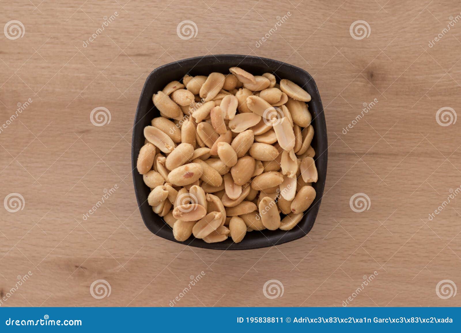 Peanuts in a container stock image. Image of black, peanuts - 195838811