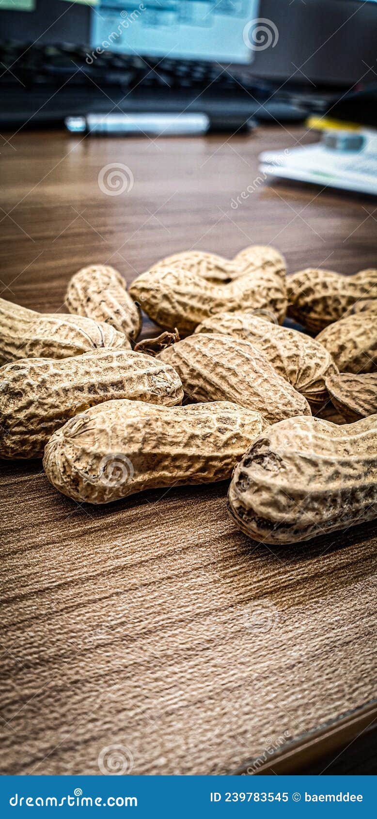 Peanuts on the desk stock image. Image of desk, time - 239783545