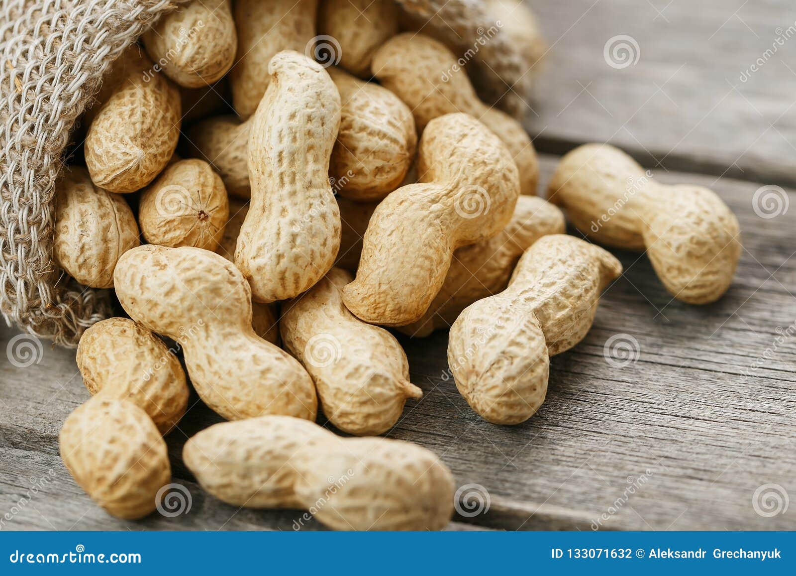 Peanuts in a Miniature Burlap Bag on Old, Gray Wooden Surface Stock ...