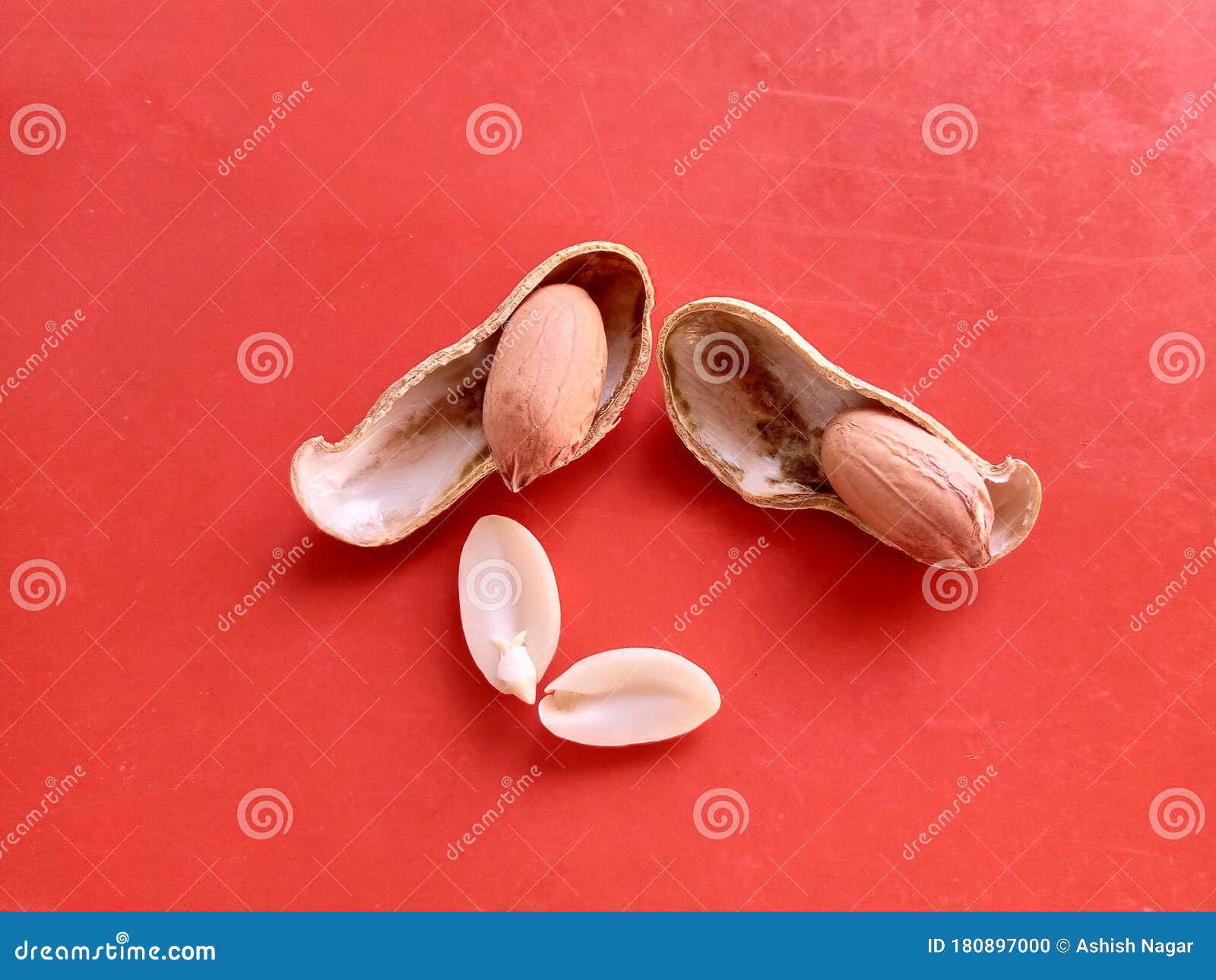 Peanuts with Shell on a Red Background Stock Photo - Image of ...