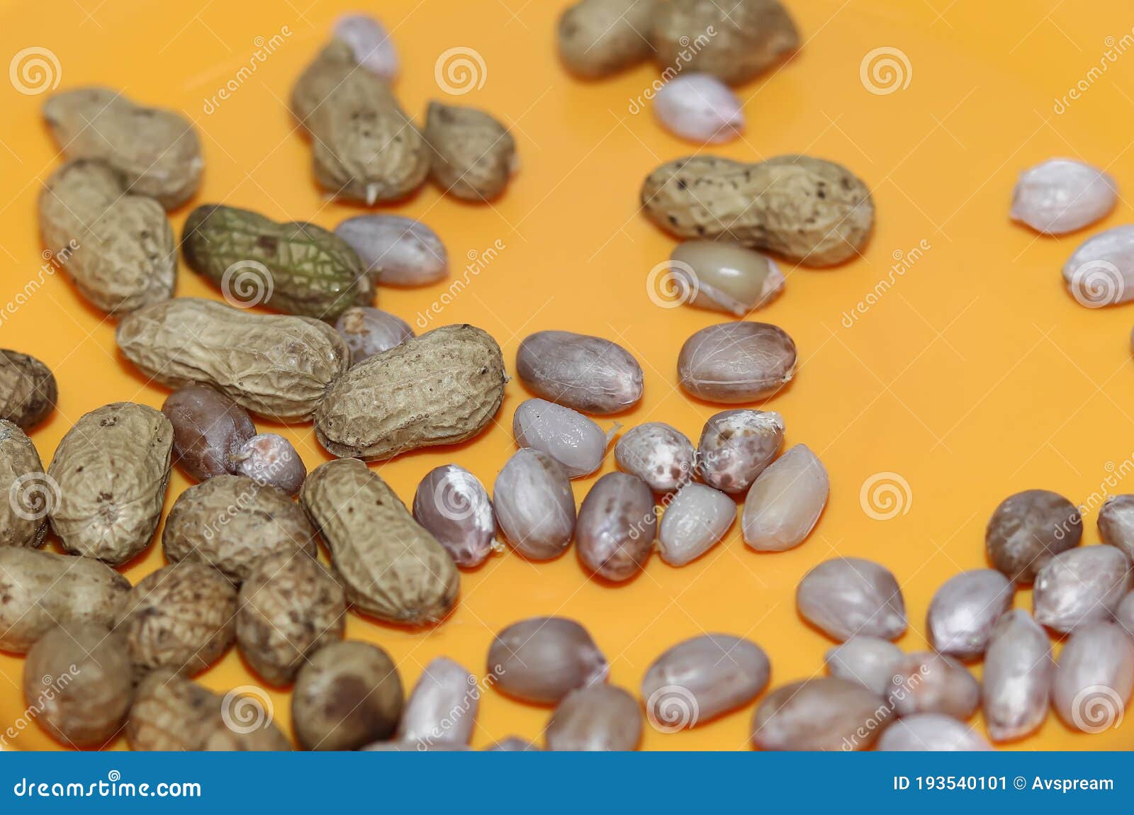 Peanuts in Shells on Yellow Background. Raw Peanuts Top View Isolated ...