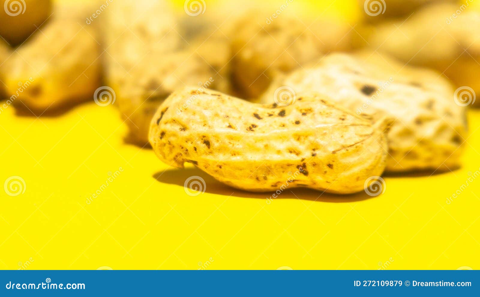 Peanuts that really Stand Out in the Group with a Yellow Background ...