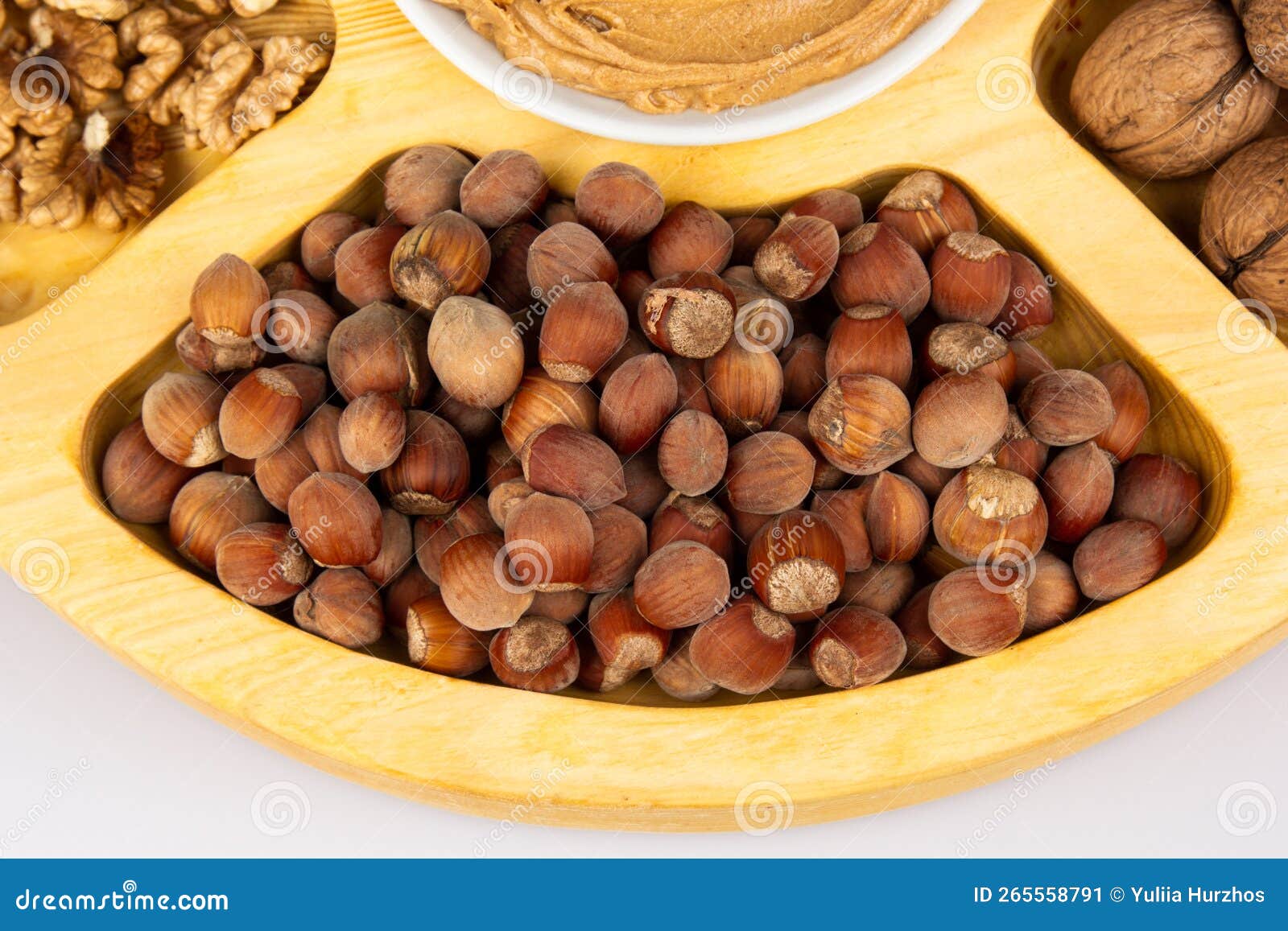 Peanuts, Walnuts and Hazelnuts in a Wooden Box with Compartments. Three ...