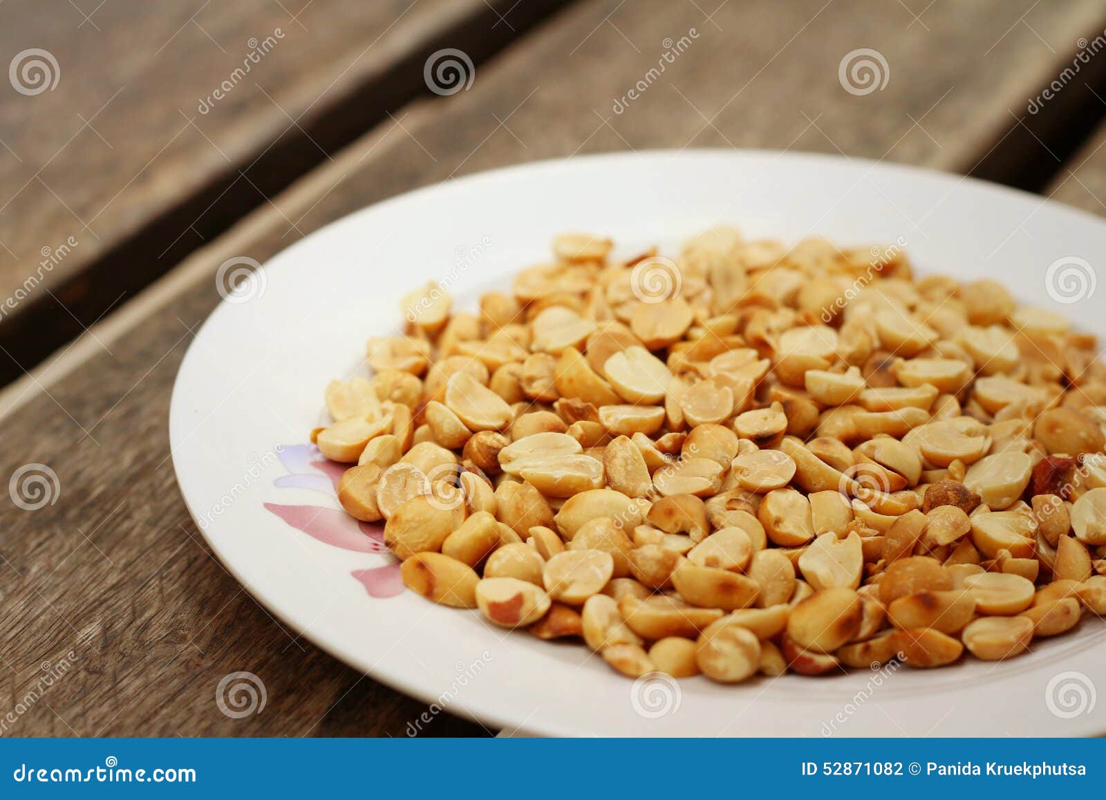 Peanuts in White Plate on a Wood Background Stock Photo - Image of ...