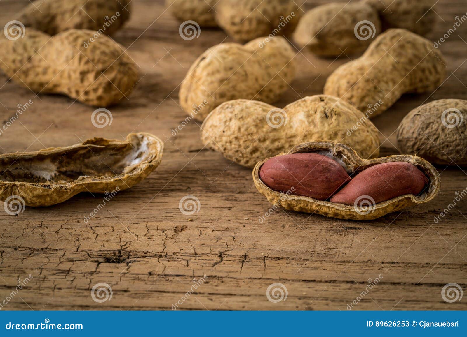 Peanuts on wood desk stock image. Image of groundnut - 89626253