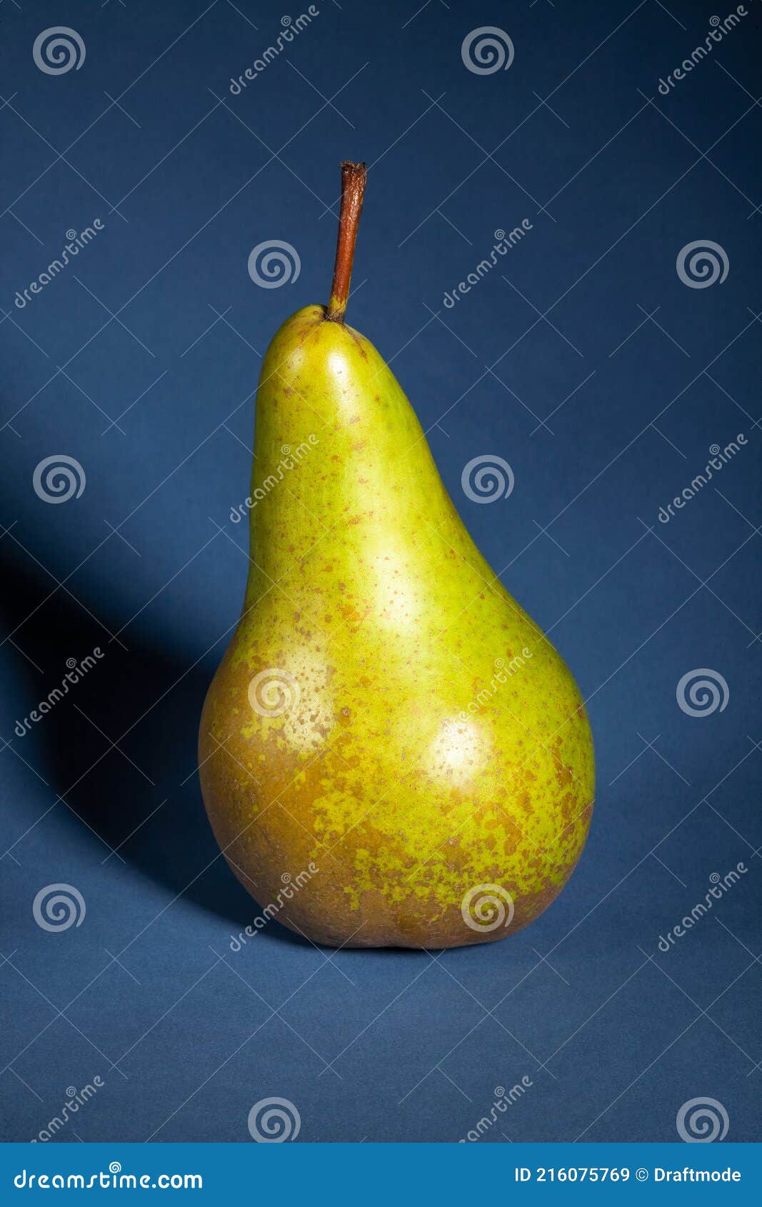 Pear on blue background stock image. Image of produce - 216075769