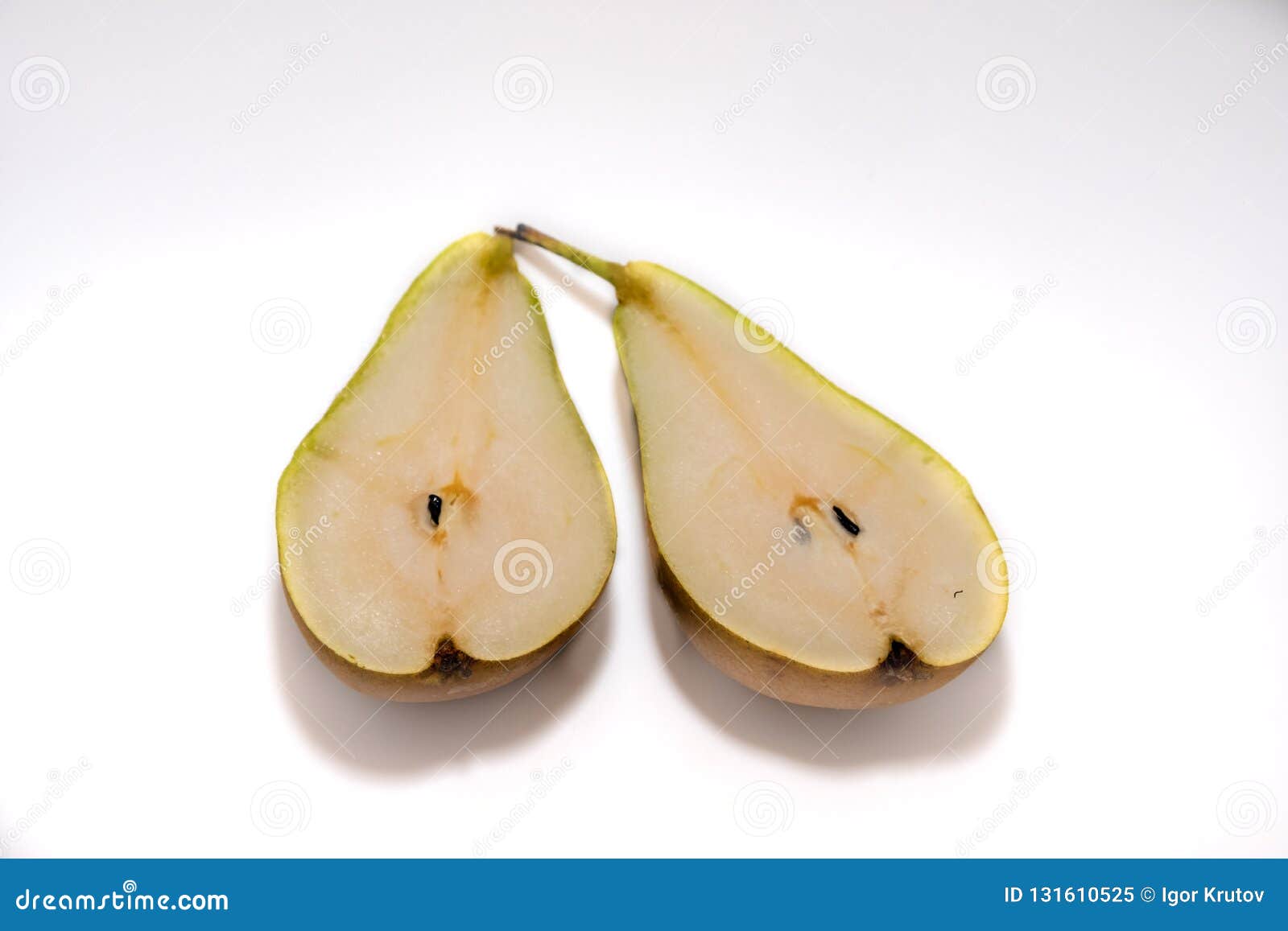 Pear Cut into Two Pieces on a White Background Stock Image - Image of ...