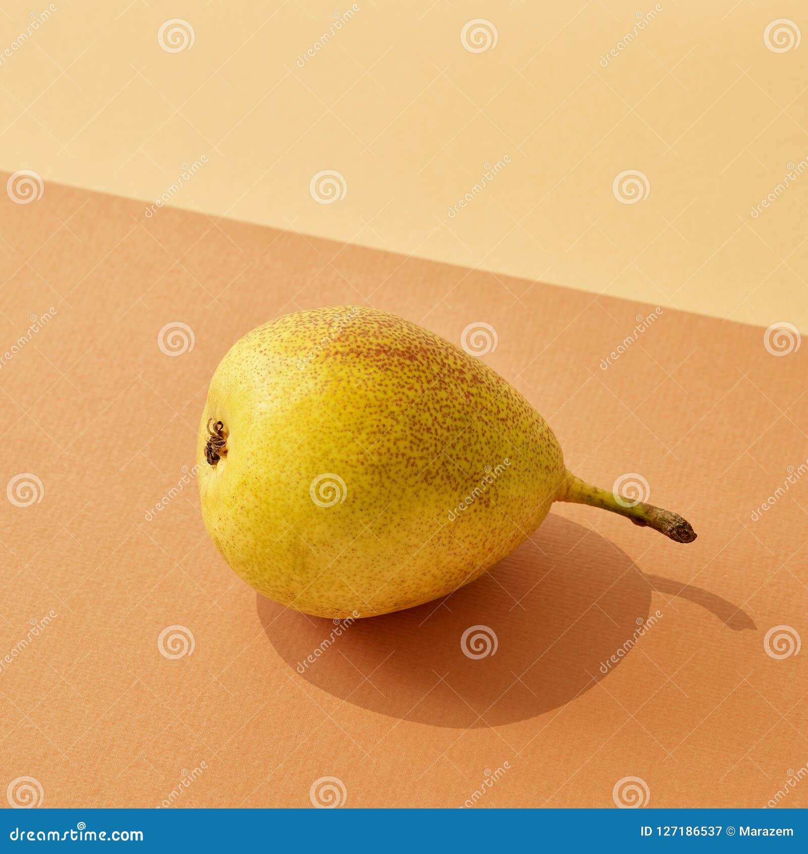 Pear with long shadow stock image. Image of organic - 127186537