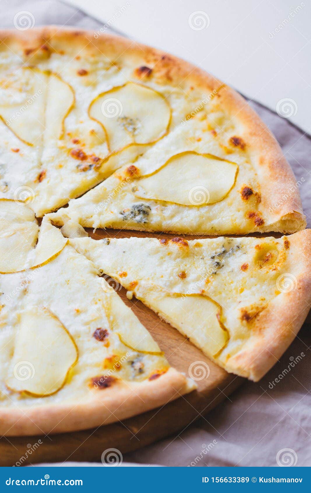 Pear pizza on the table stock image. Image of pear, girl - 156633389