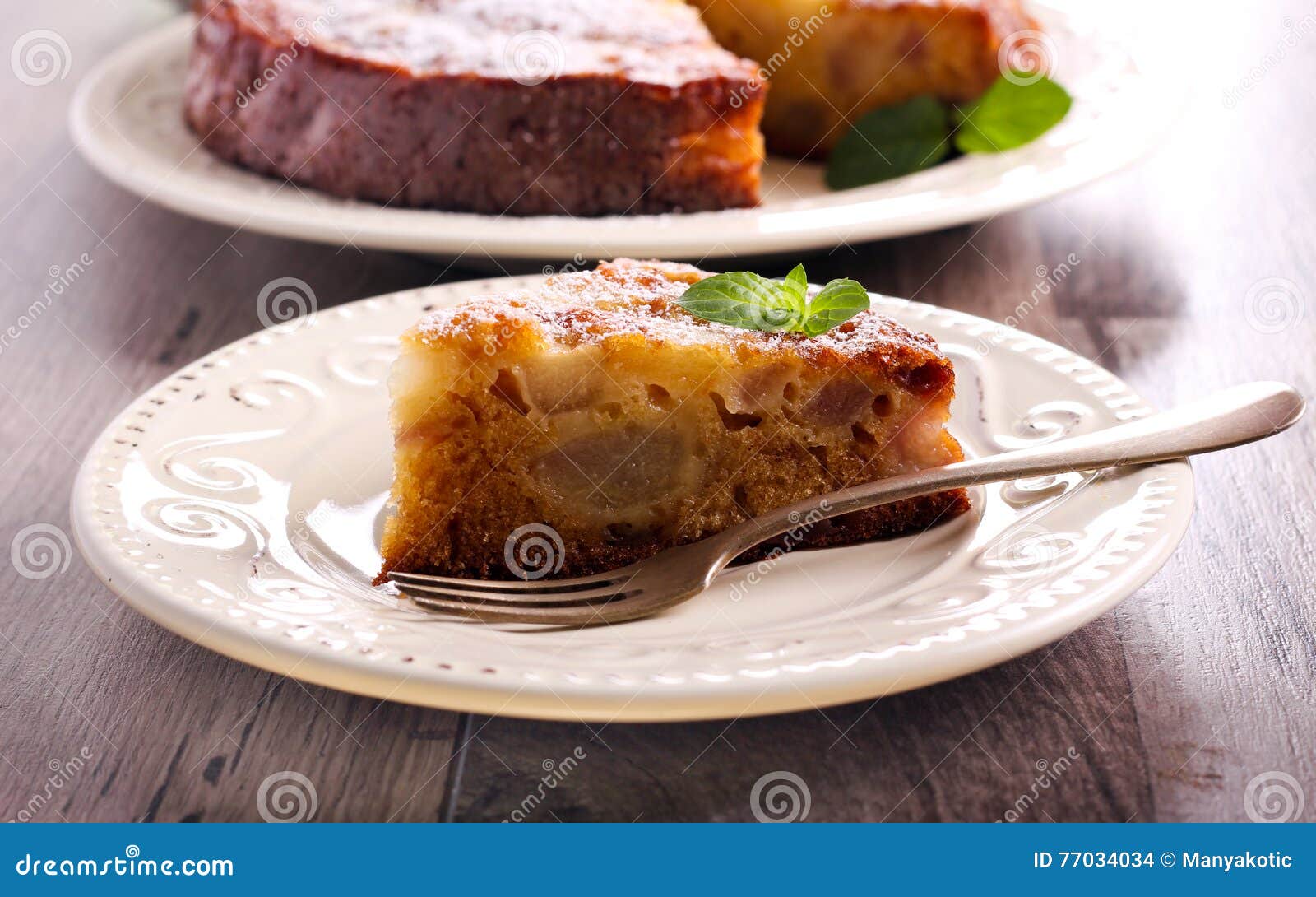 Pear Sponge Cake with Icing Sugar Stock Photo - Image of plate, snack ...