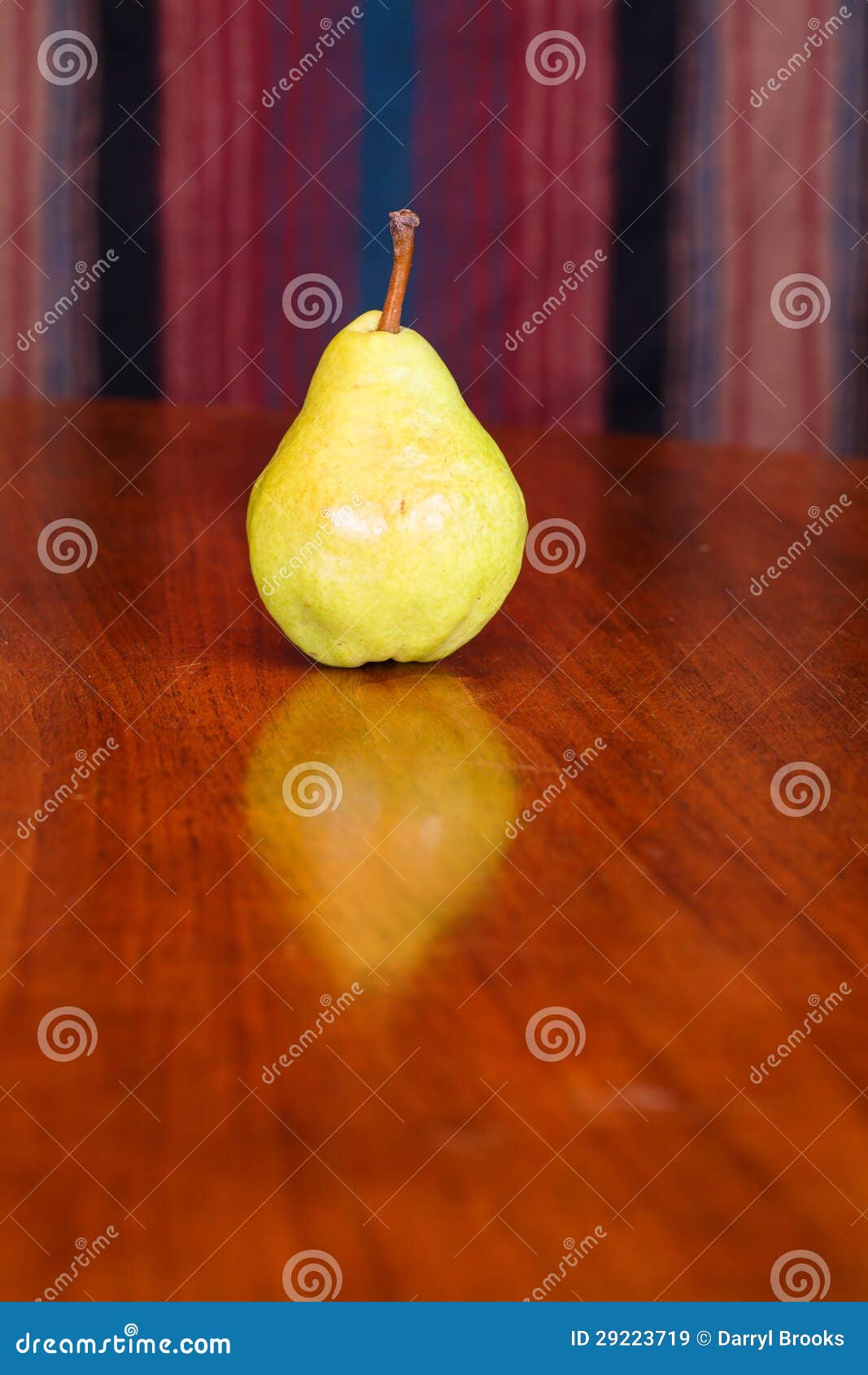 Pear on Wood Table stock image. Image of reflection, delicious - 29223719