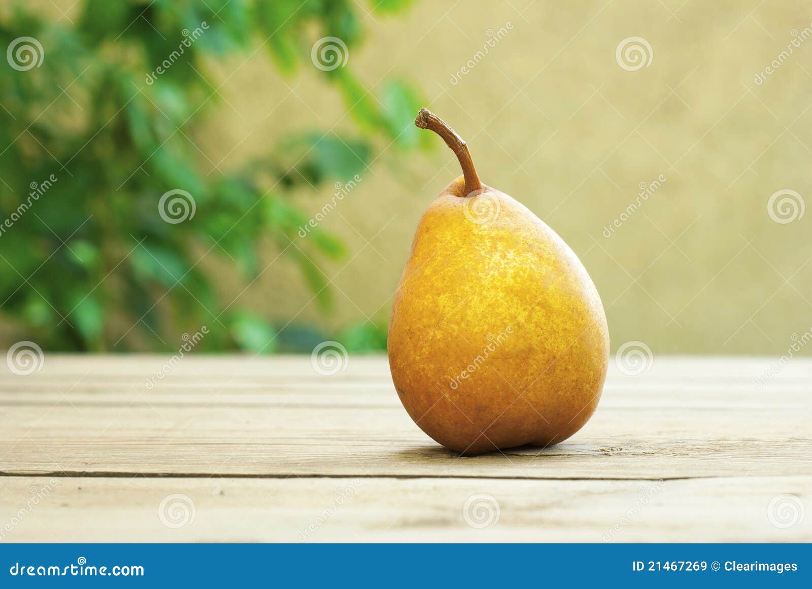 Pear on wooden table stock image. Image of ripe, small - 21467269