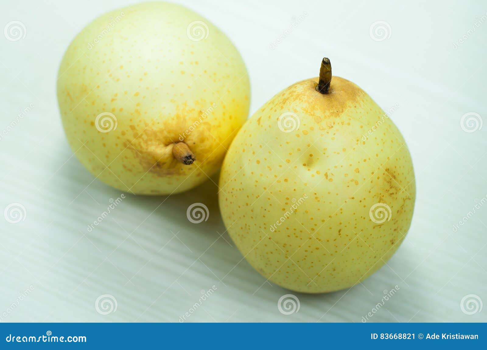 Pear on a wooden white stock image. Image of full, stem - 83668821