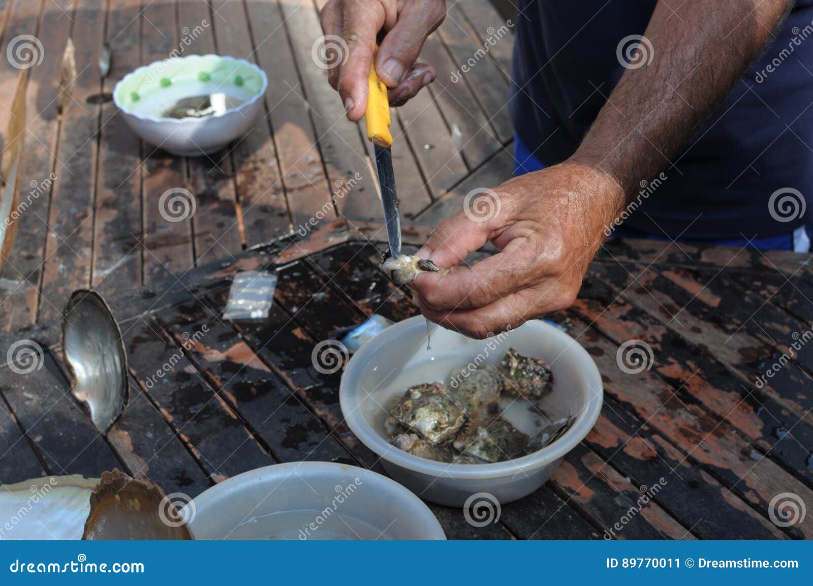 Pearl extraction stock image. Image of green, extract - 89770011