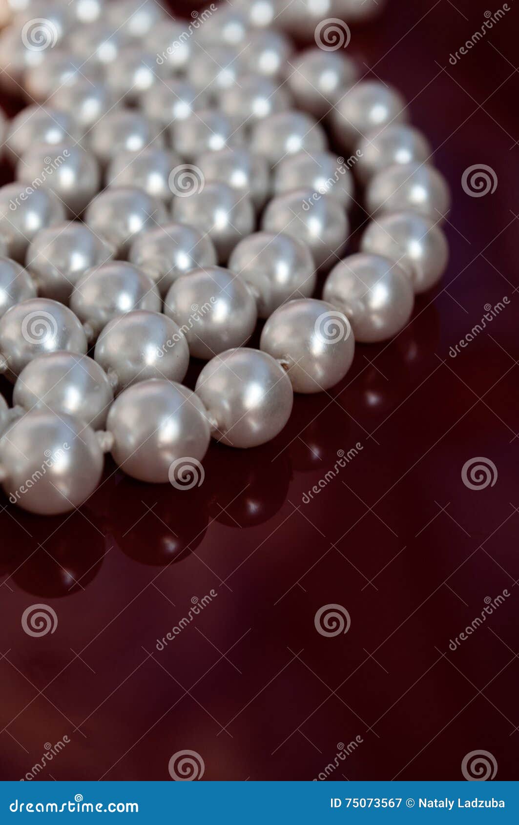 Pearl on a glossy surface stock image. Image of elegance - 75073567