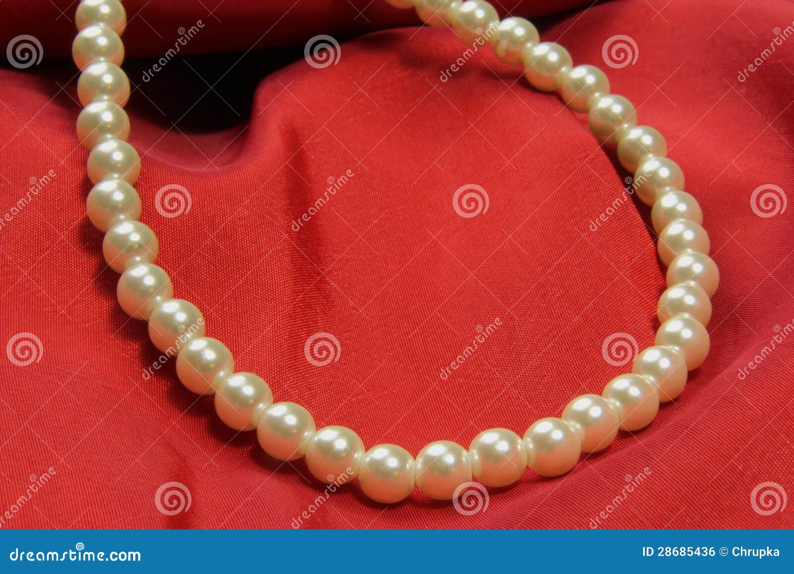 Pearl Necklace on Red Fabric Stock Photo - Image of romance, gift: 28685436
