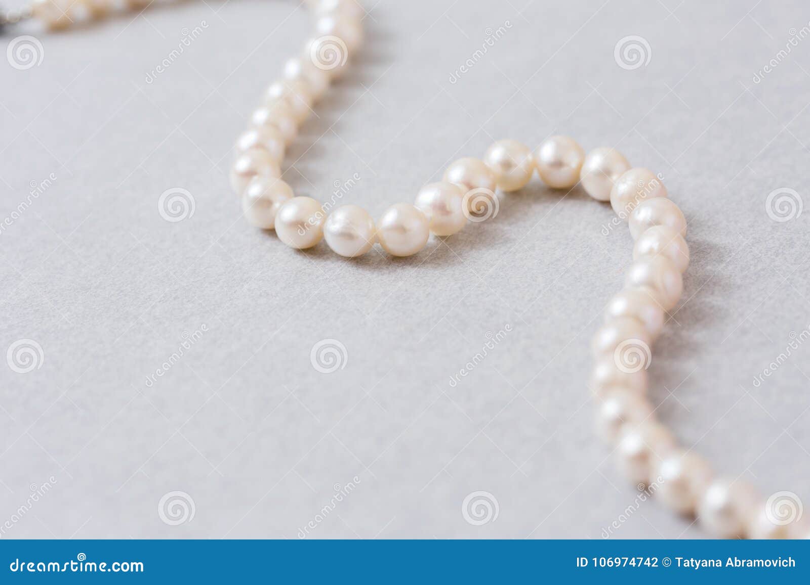 The Pearl Thread is Arranged with a Wave on a Light Pink Pearl ...