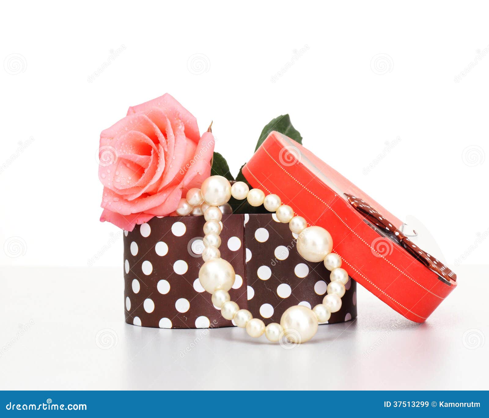 Pearls Inside Open Gift Box with Pink Rose Stock Image - Image of ...