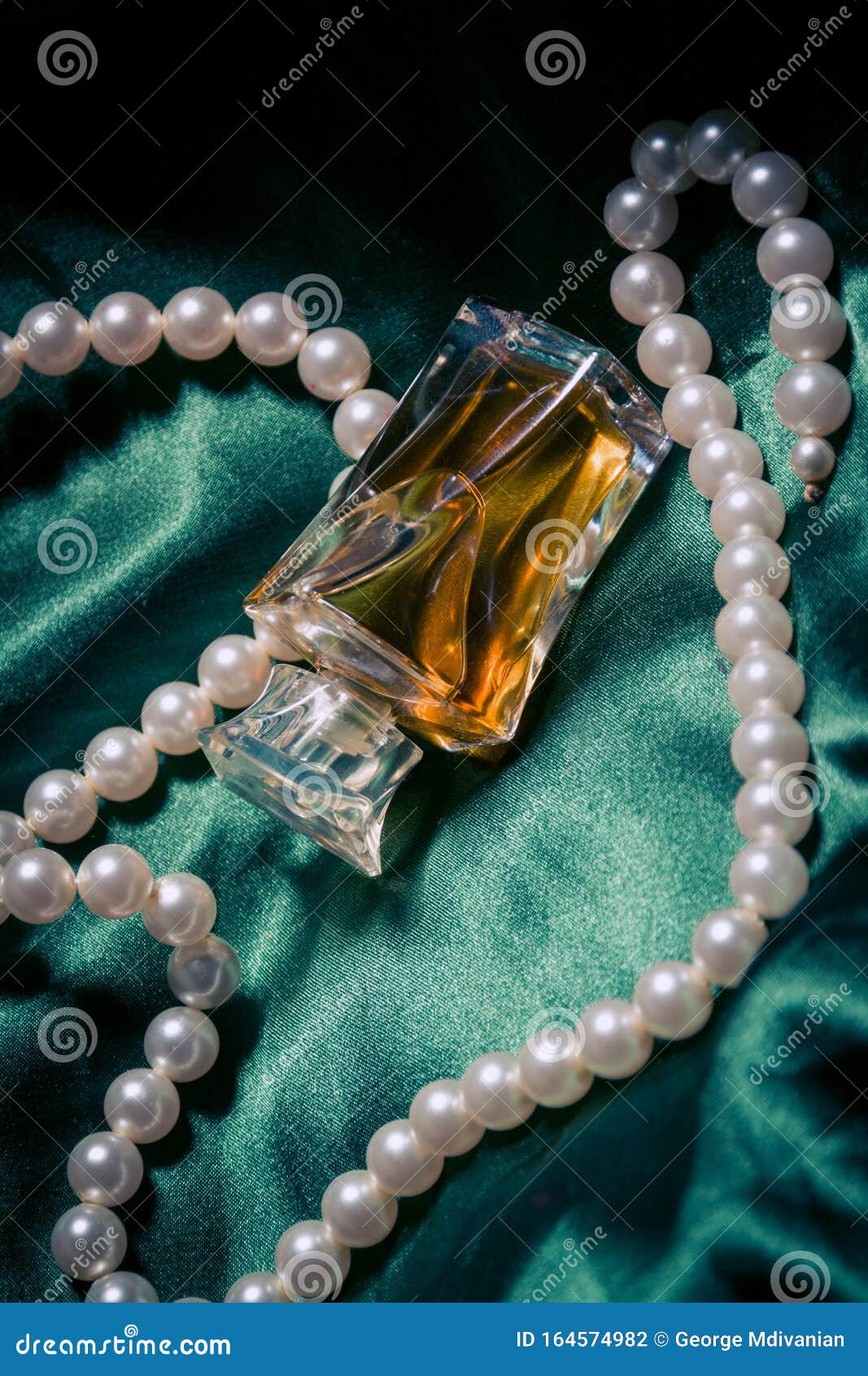 Pearls and perfume closeup stock photo. Image of bridal - 164574982