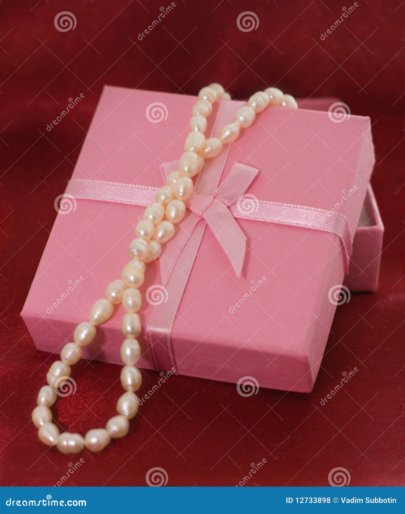 Pearls at pink box stock photo. Image of clothing, bead - 12733898