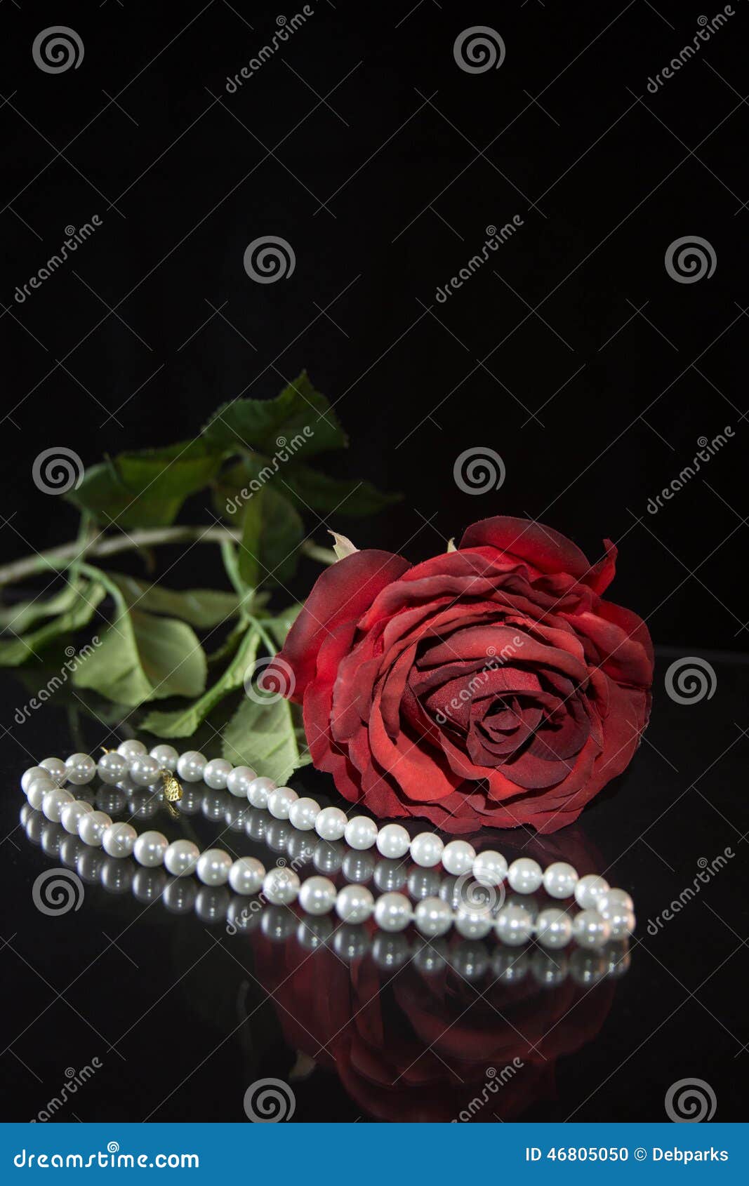 Pearls and Red Rose on Black Background Stock Photo - Image of stem ...