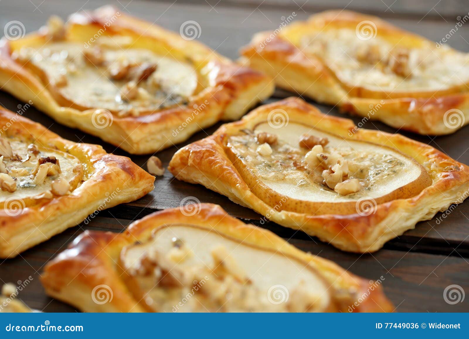 Pears Baked in Puff Pastry with Gorgonzola Cheese and Walnuts Stock ...
