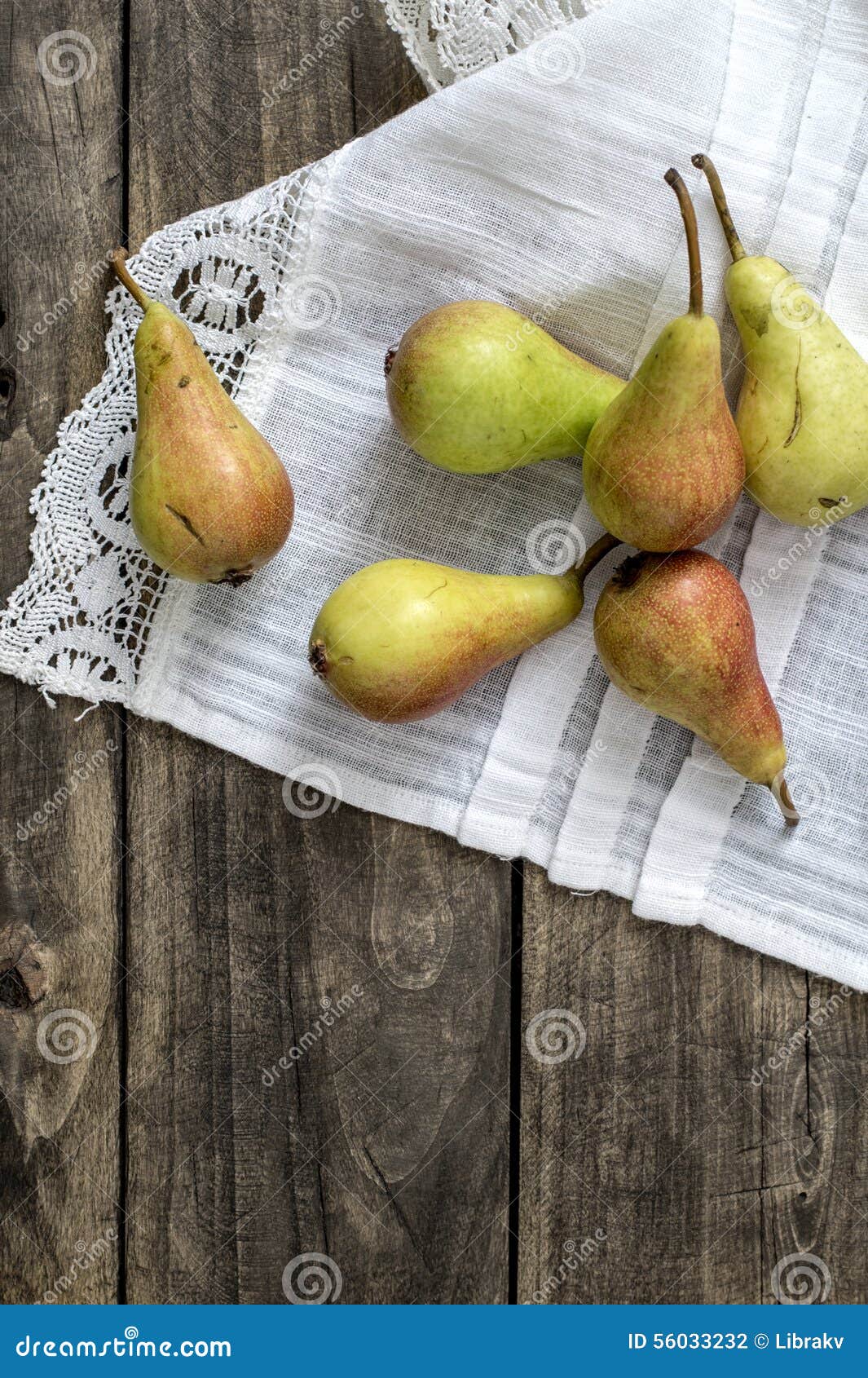 Pears on Dark Wooden Table stock photo. Image of brown - 56033232