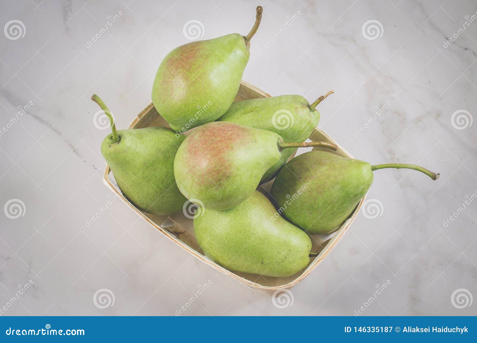 Pears in a Straw Box/pears in a Straw Box on a Marble Background, Top ...