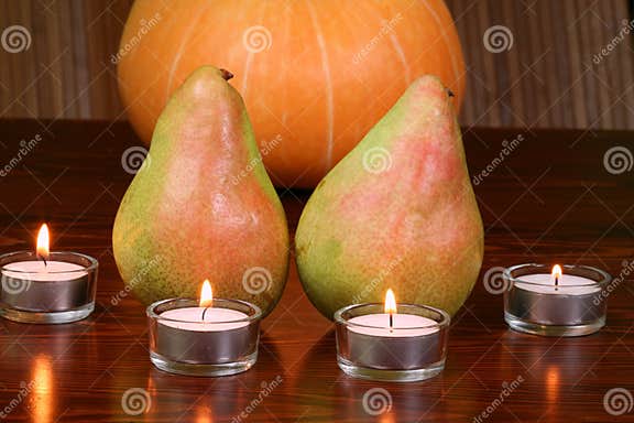 Pears and tealights stock photo. Image of sphere, halloween - 12013436