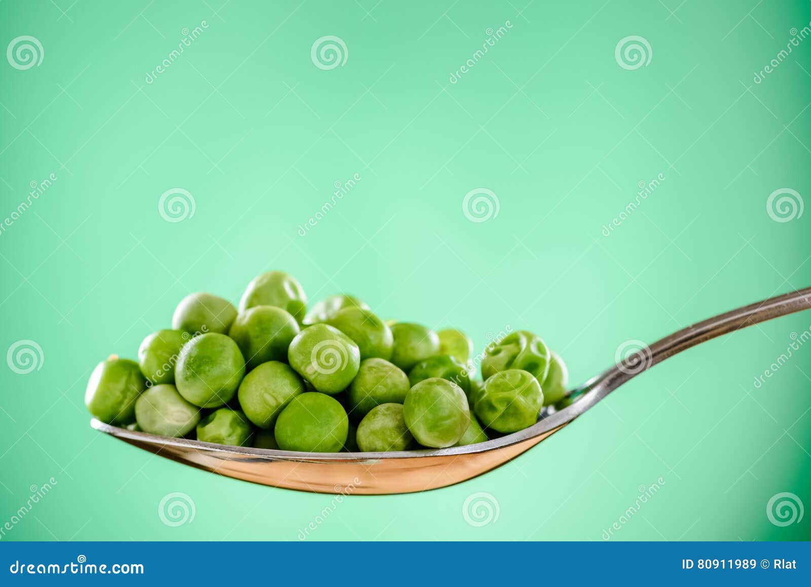 Peas on a spoon stock image. Image of single, healthy - 80911989