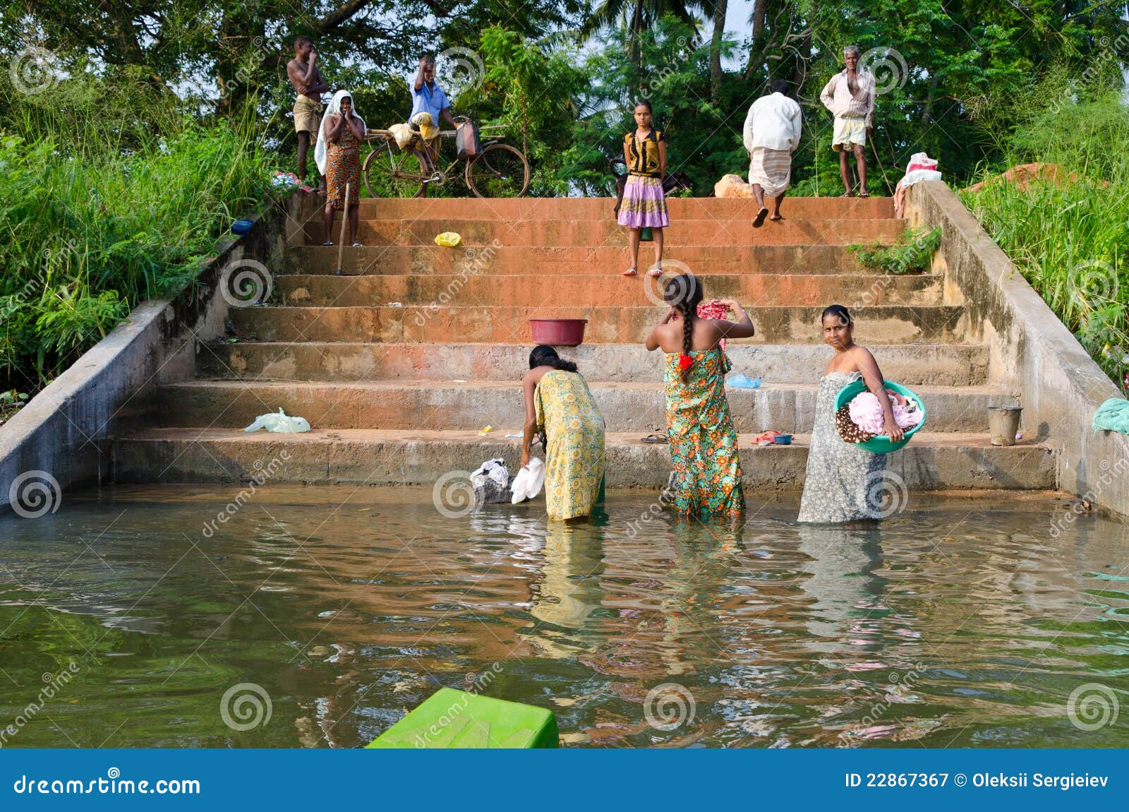 Village Women Bathing In Pond