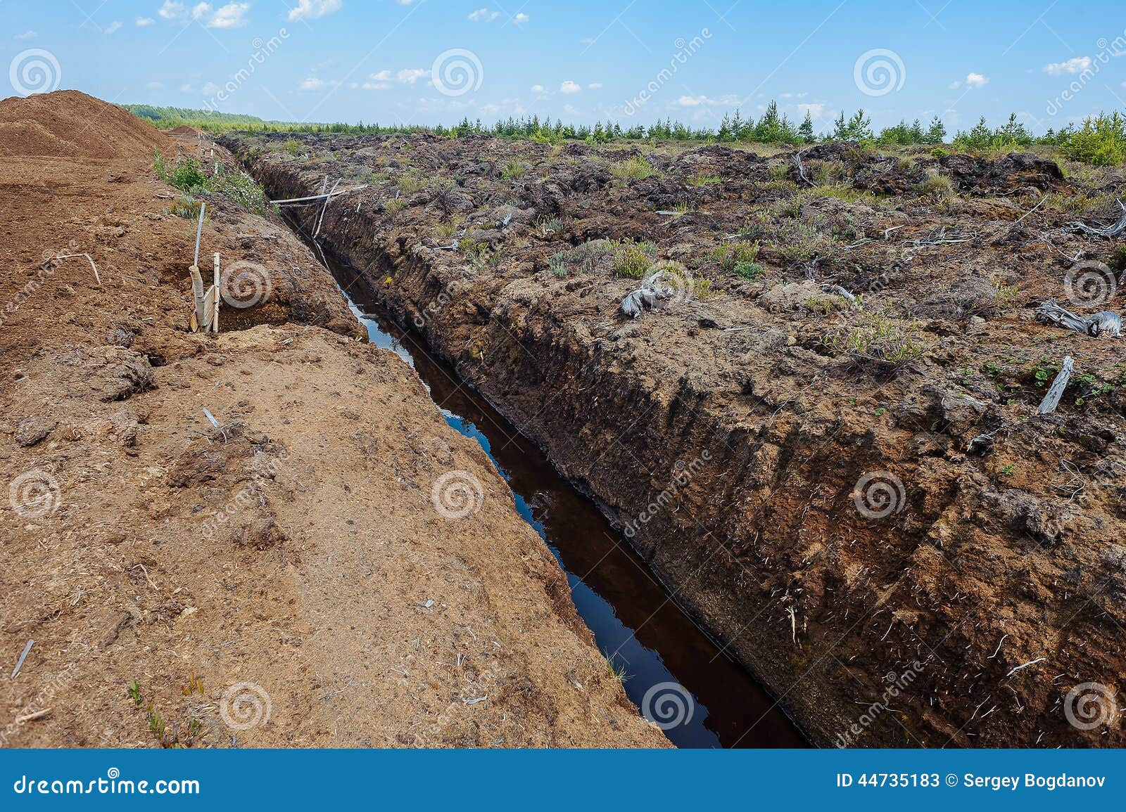 Peat extraction in a field stock image. Image of land - 44735183