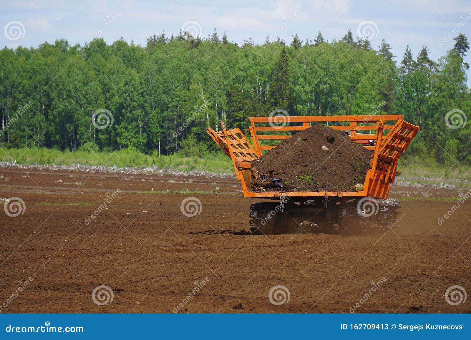 Peat truck in the field stock image. Image of harvester - 162709413