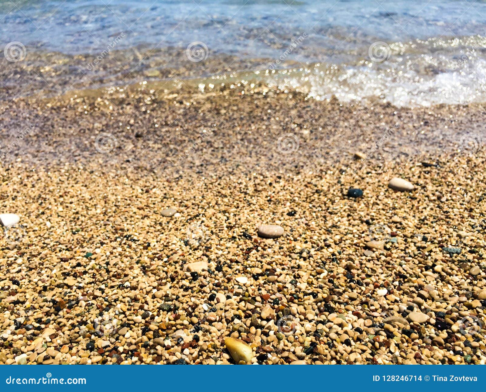 Pebble beach background stock photo. Image of black - 128246714