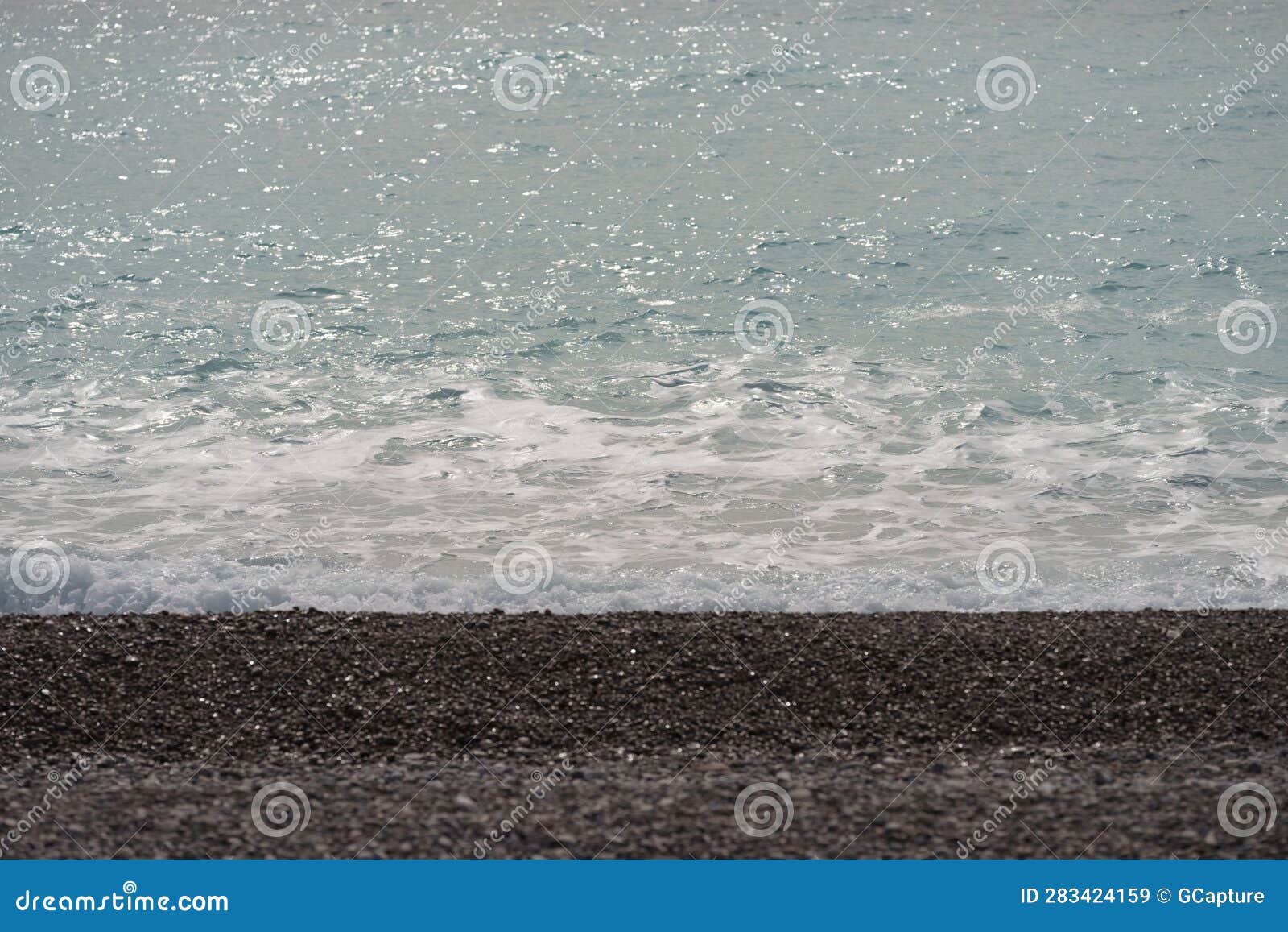 Pebble Beach with Nice Clean Sea Waves Stock Image - Image of clean ...