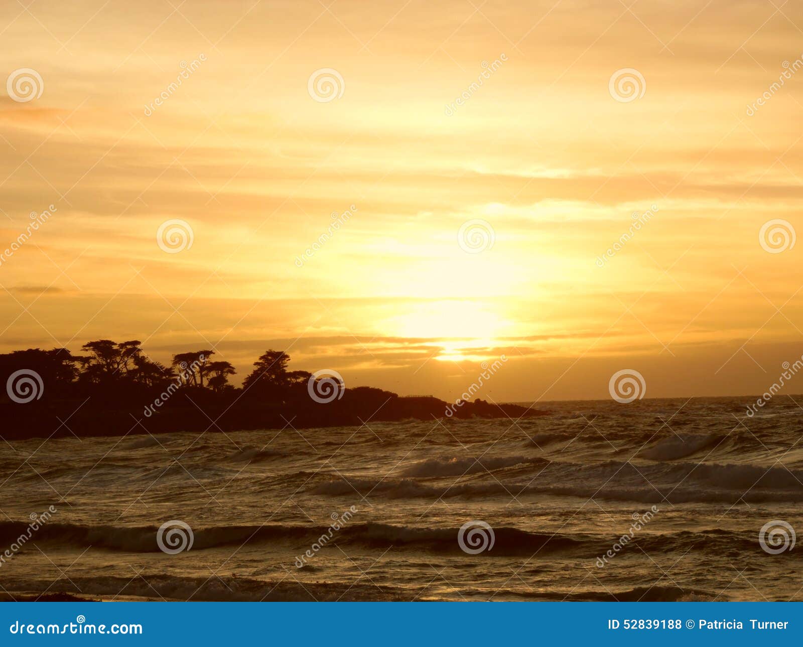 Pebble Beach ocean sunset stock photo. Image of windy - 52839188