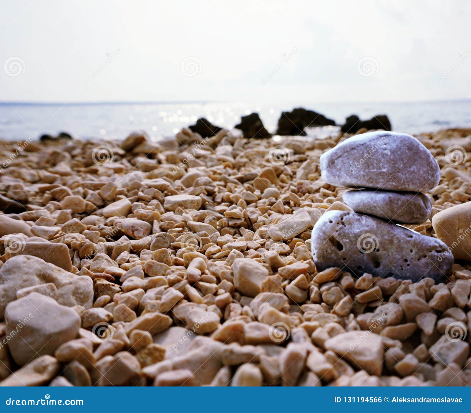Pebble Beach with Stone Cairn Stock Photo - Image of rock, abstract ...
