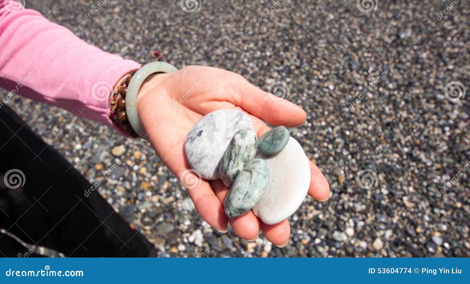 Pebble on Female Hand stock photo. Image of hand, stone - 53604774