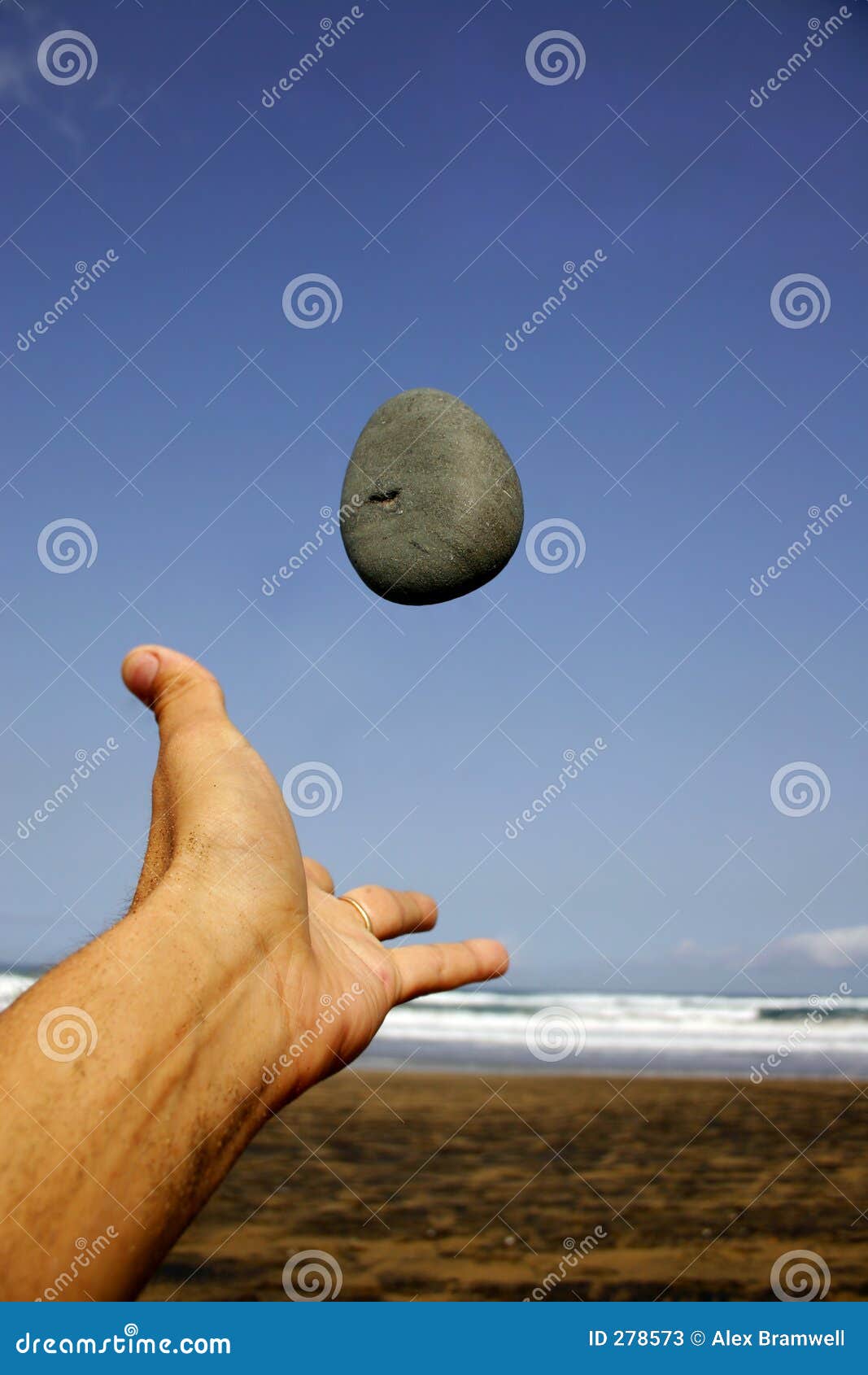 Pebble and Hand stock image. Image of throw, ocean, finger - 278573