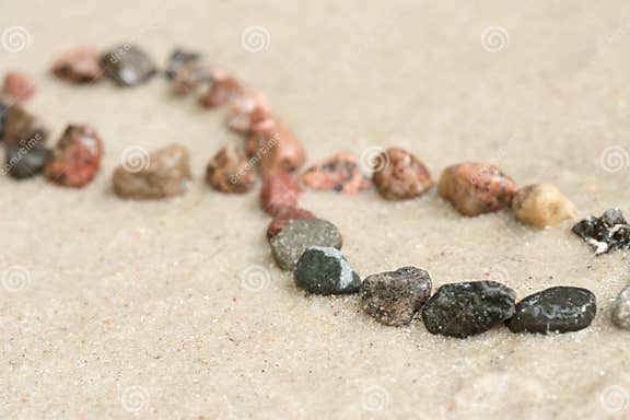 Pebble Infinity Symbol on Sand Selective Focus Stock Photo - Image of ...