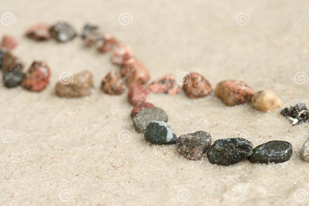 Pebble Infinity Symbol on Sand Selective Focus Stock Photo - Image of ...