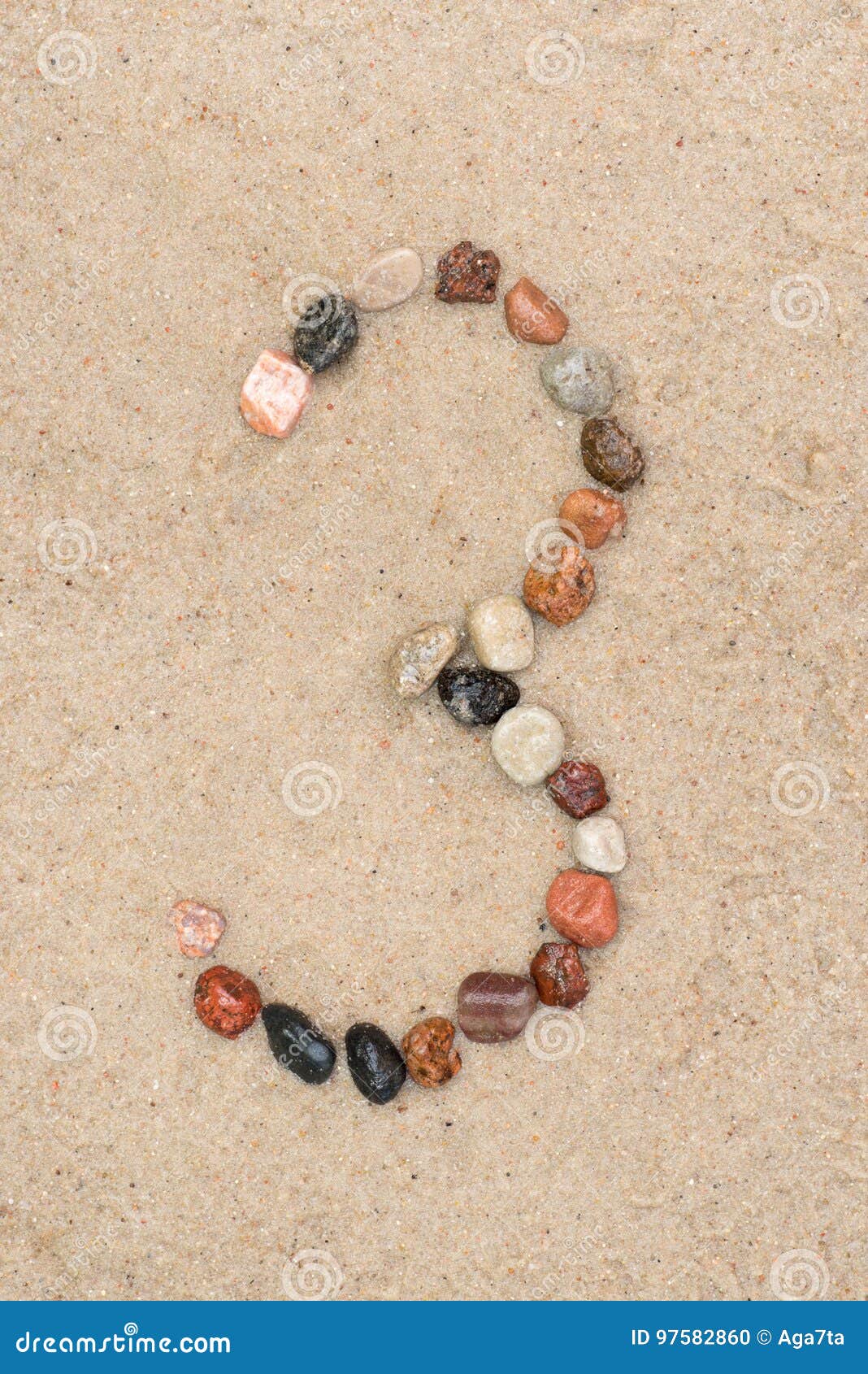 Pebble 3 Number on Sand Selective Focus Stock Photo - Image of color ...