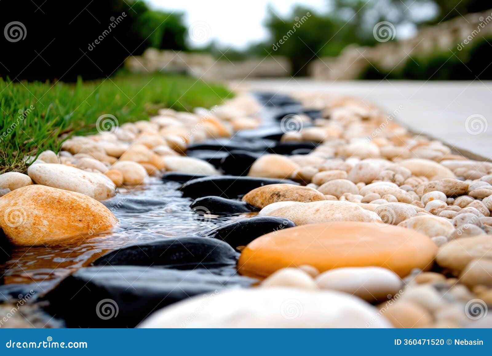 Pebble Pathway with Flowing Water in Tranquil Garden Setting Stock ...